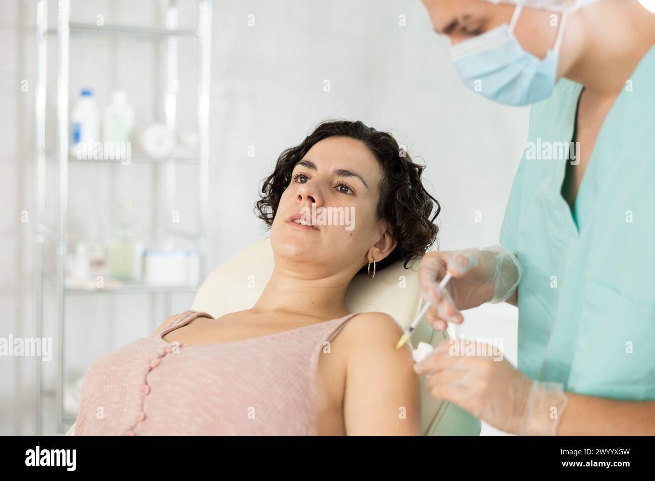 arm injection female patient Stock Photo - Alamy