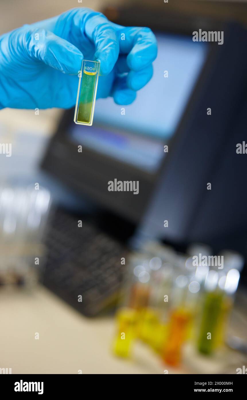 Spectrophotometer UV / VIS Laboratory Analysis Researchers analyzing ...