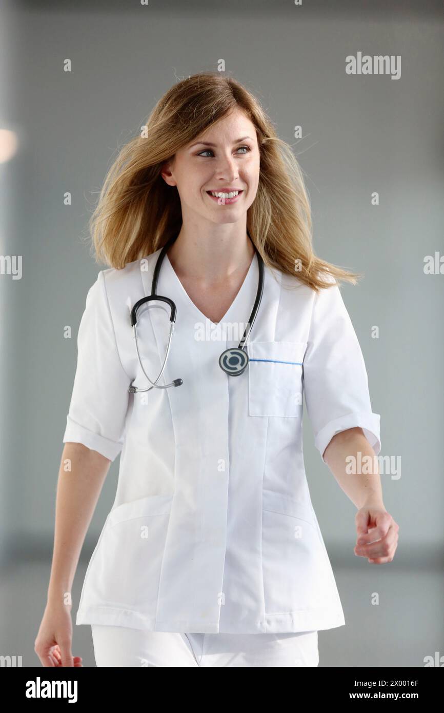 Nurse walking in corridor, Onkologikoa Hospital, Oncology Institute ...