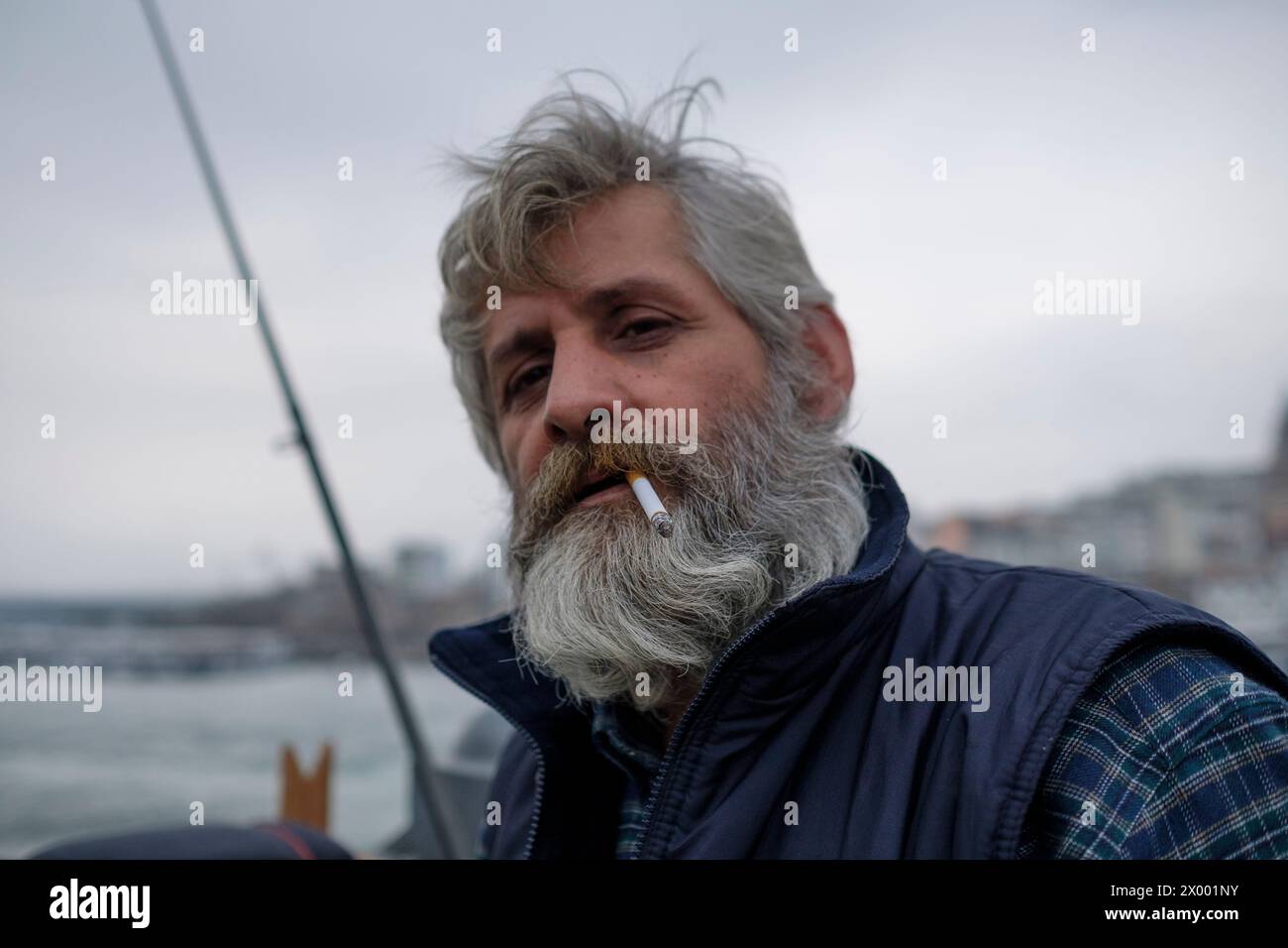 Man smoking a cigarette Stock Photo - Alamy