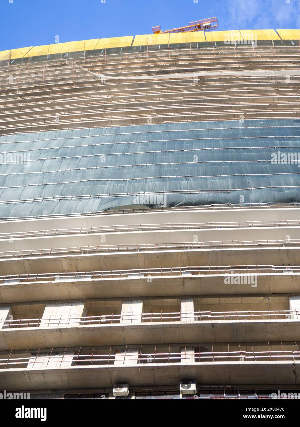 Concrete frame without facade. Unfinished construction of a multi-story ...