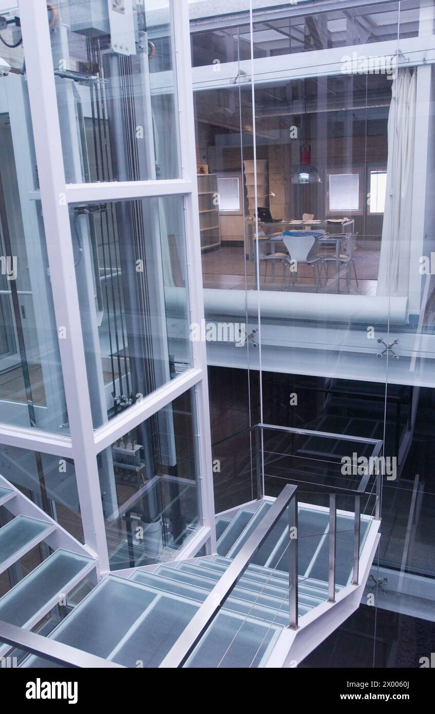 Offices, glass staircase and elevator Stock Photo - Alamy