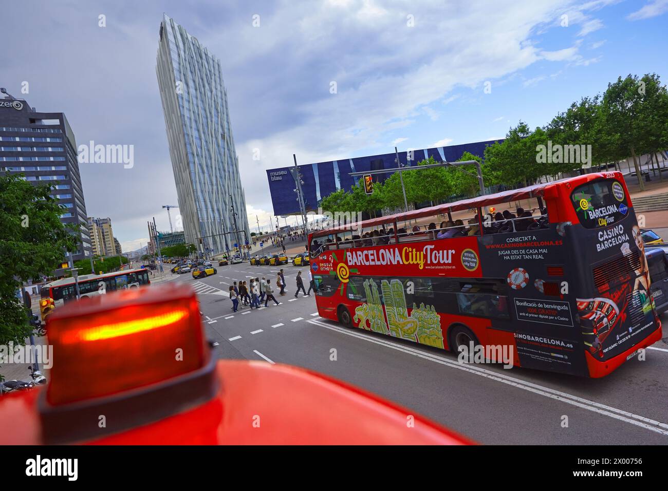 Tourist Bus. Diagonal Zero Zero Tower designed by the architect Enric ...