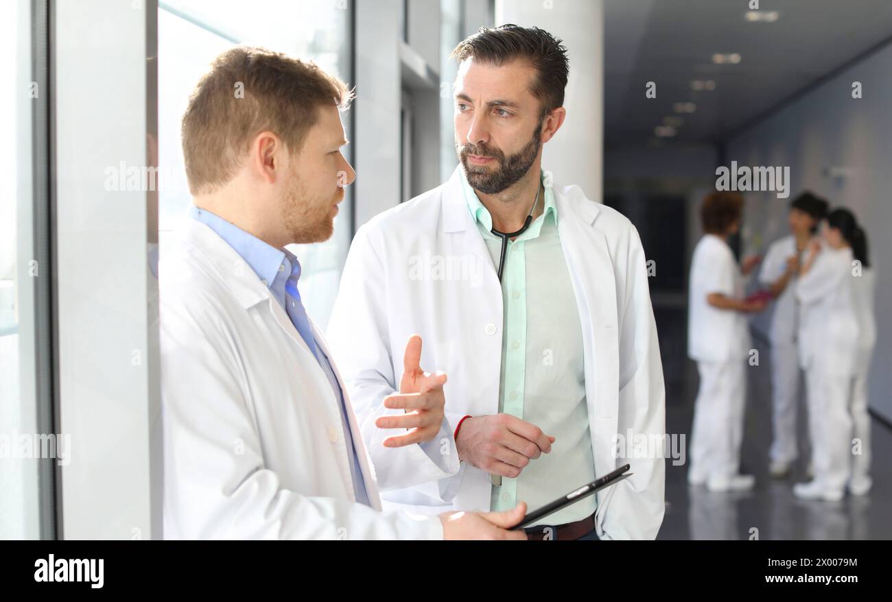 Doctors and nurses talking in corridor, Hospital, Spain Stock Photo - Alamy
