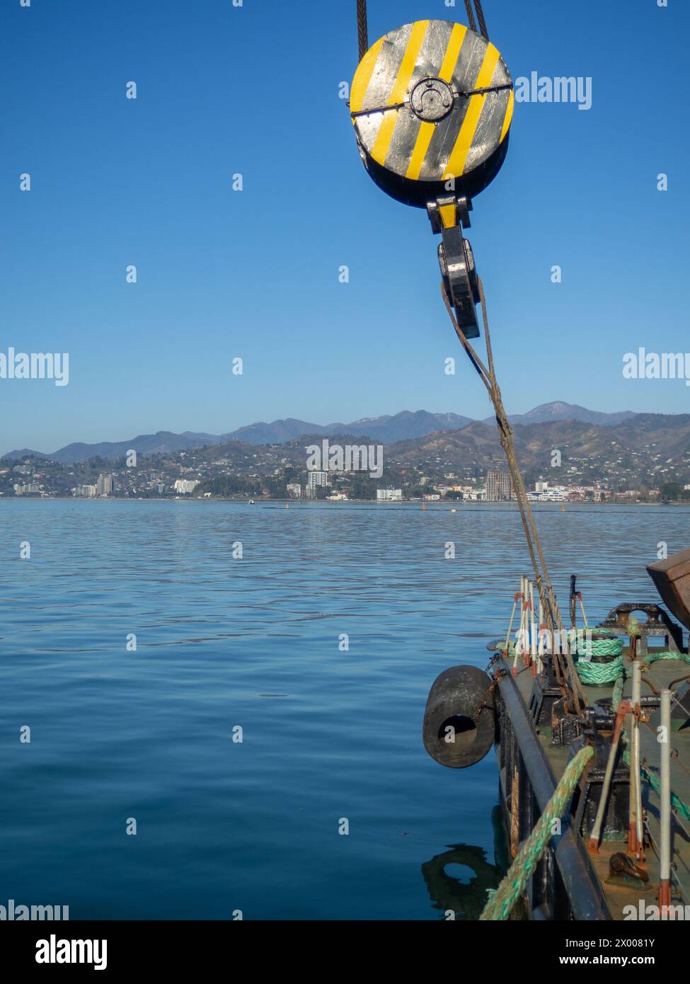 Part of a ship's crane. Rigging. Marine crane. Construction equipment ...