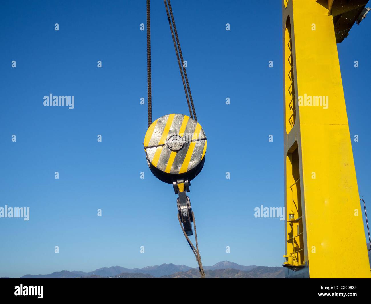 Part of a ship's crane. Rigging. Marine crane. Construction equipment ...