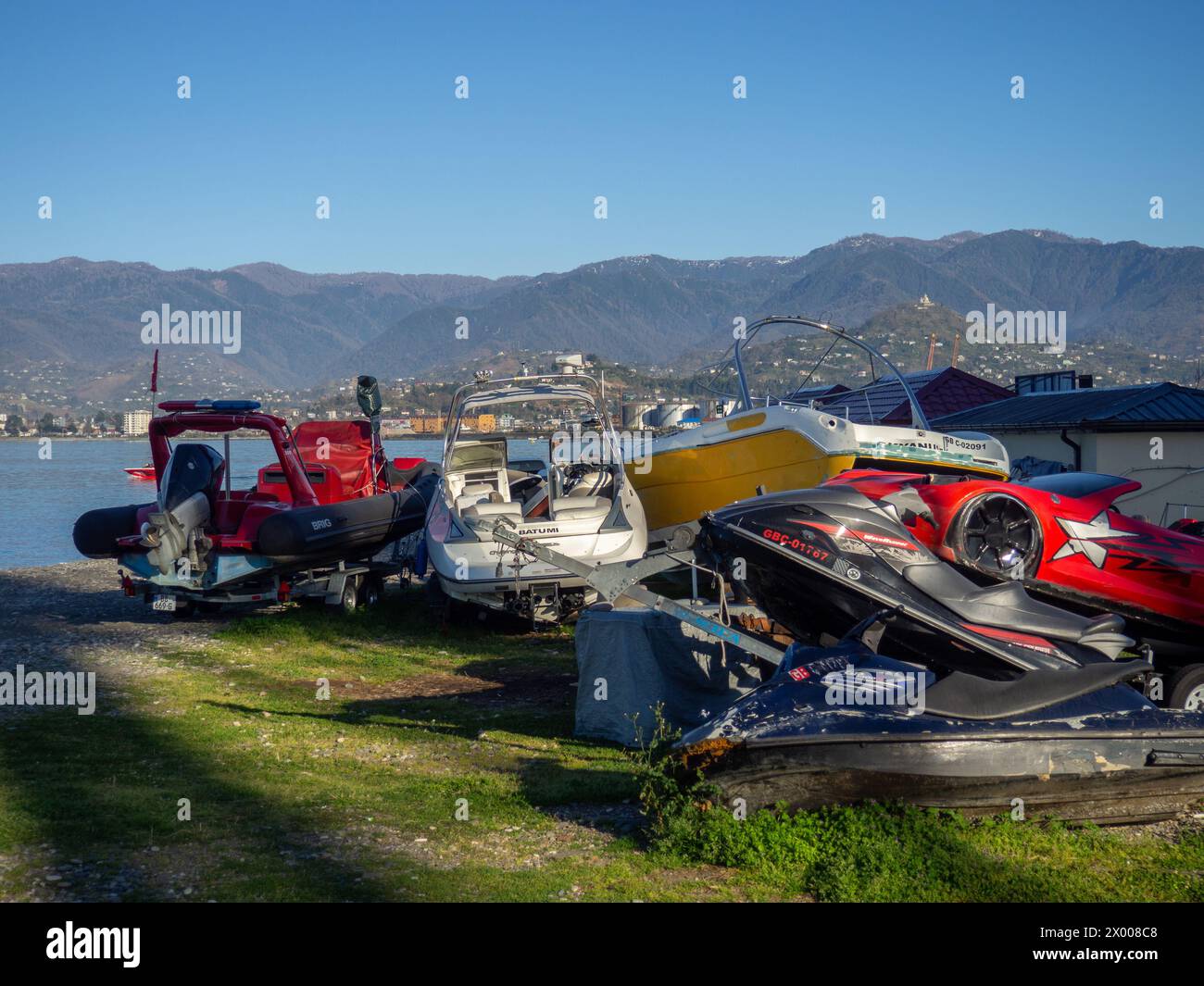 Boat dump. Inoperative vehicles. A pile of scrap metal. In winter at ...