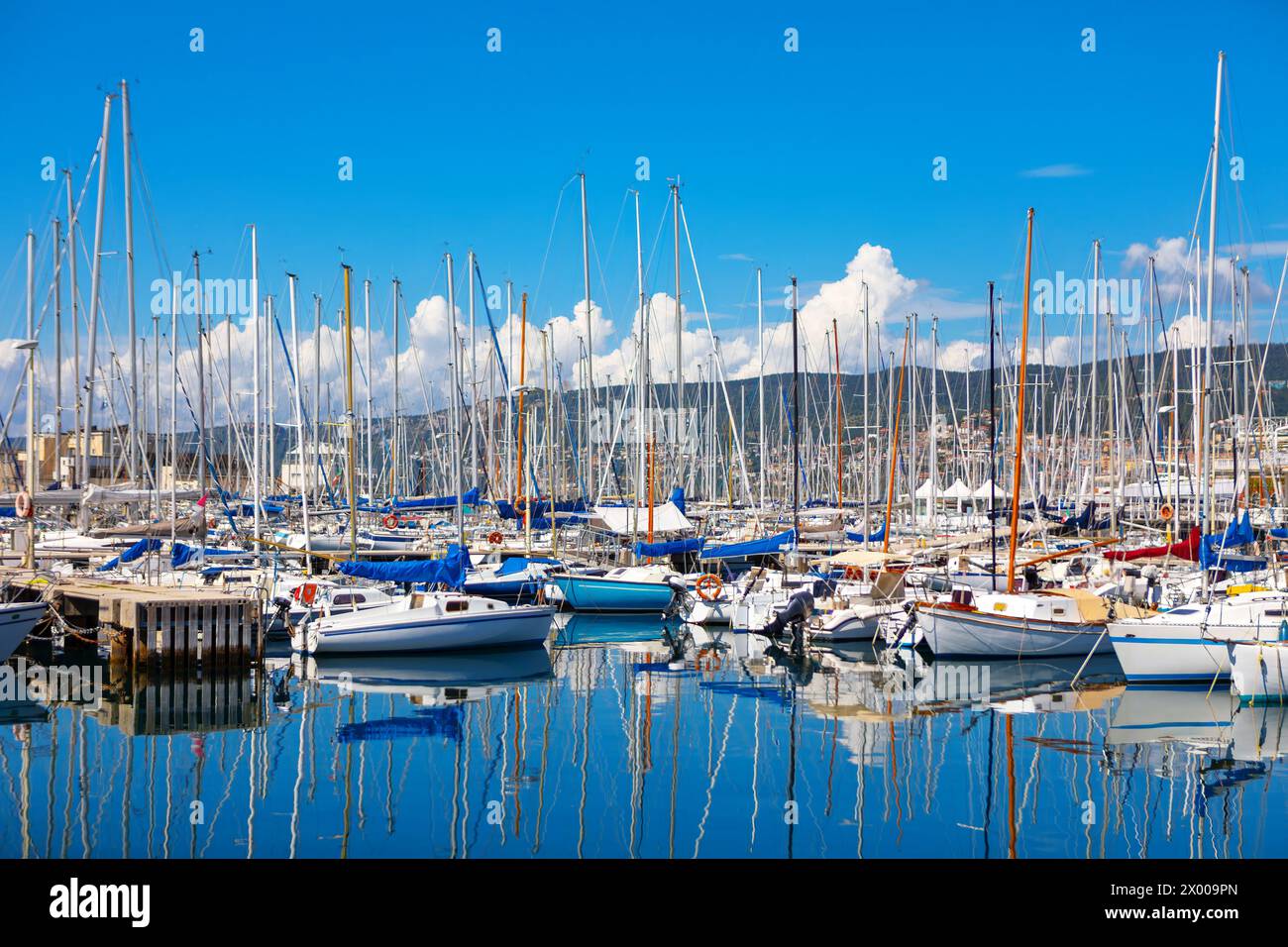 Majestic masts of yachts in the port. Symbol of adventure and luxury ...