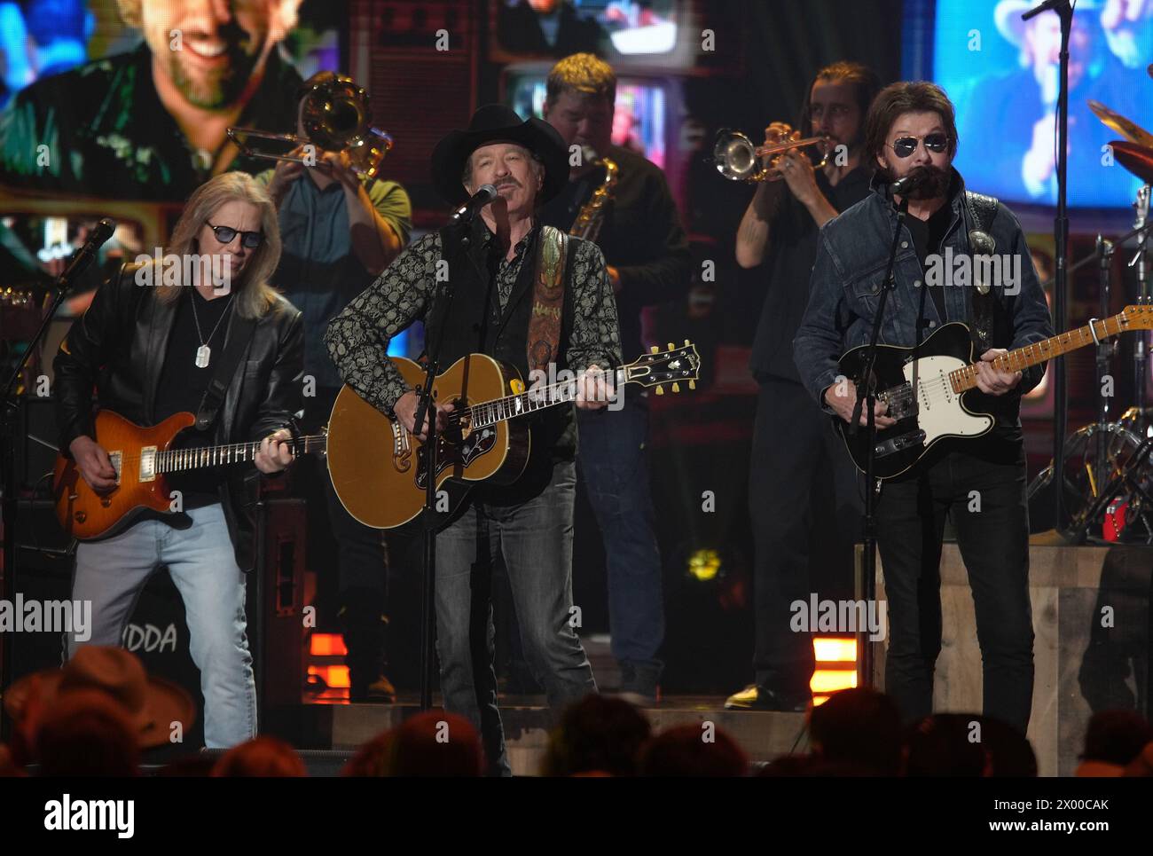 Kix Brooks and Ronnie Dunn of Brooks and Dunn perform onstage during ...