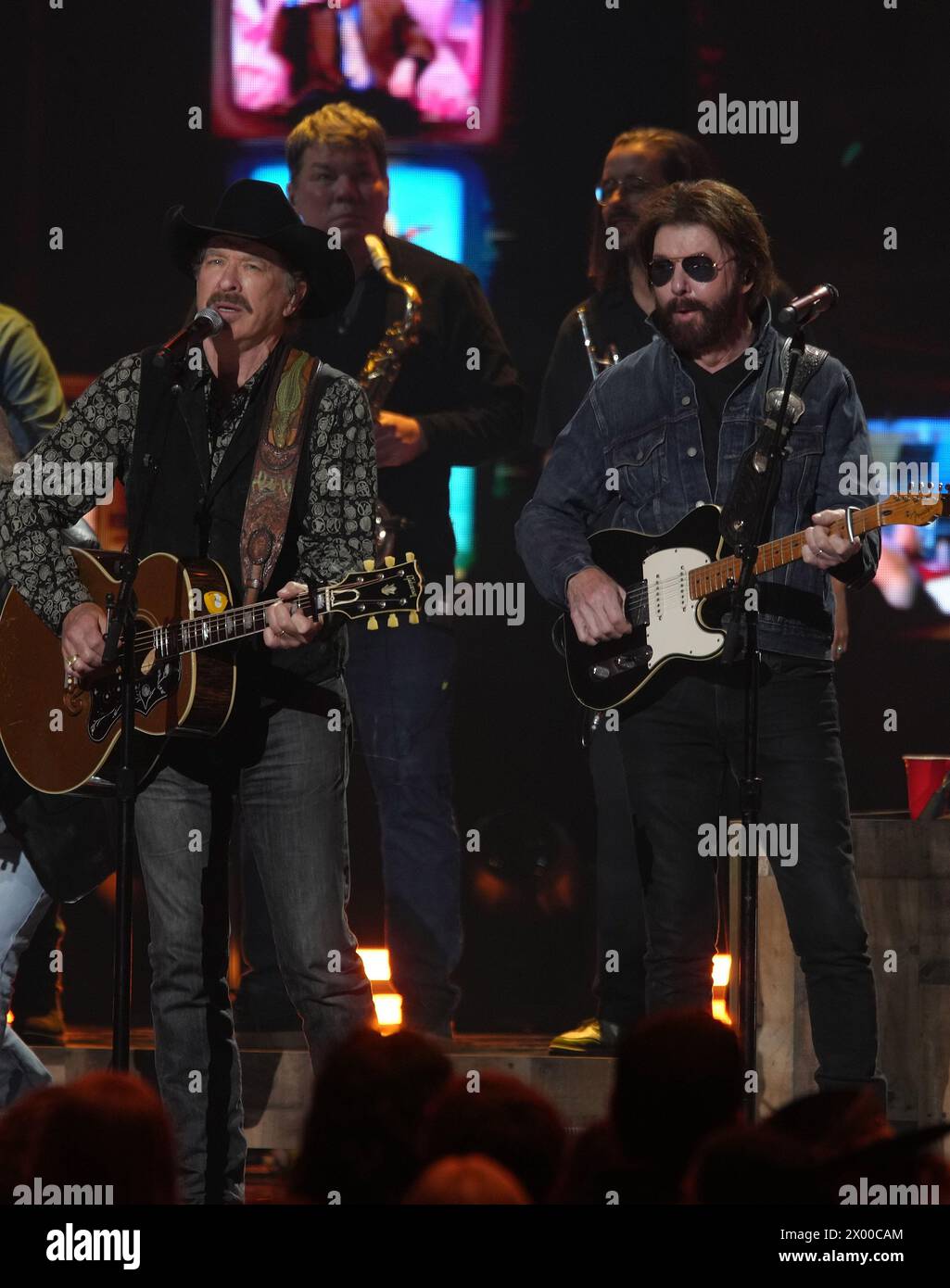 Kix Brooks and Ronnie Dunn of Brooks and Dunn perform onstage during ...