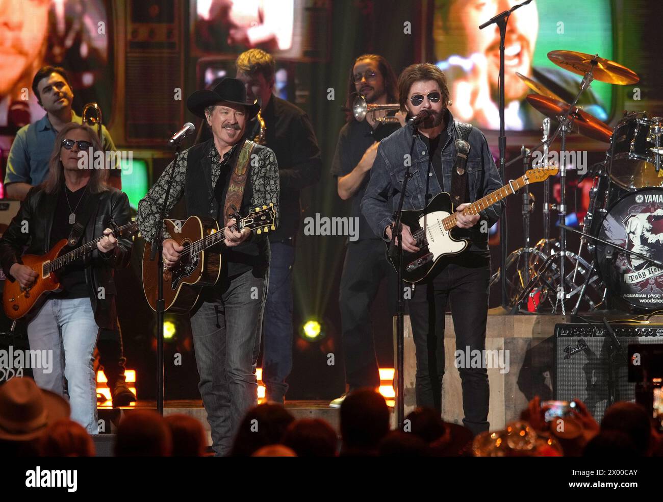 Kix Brooks and Ronnie Dunn of Brooks and Dunn perform onstage during ...