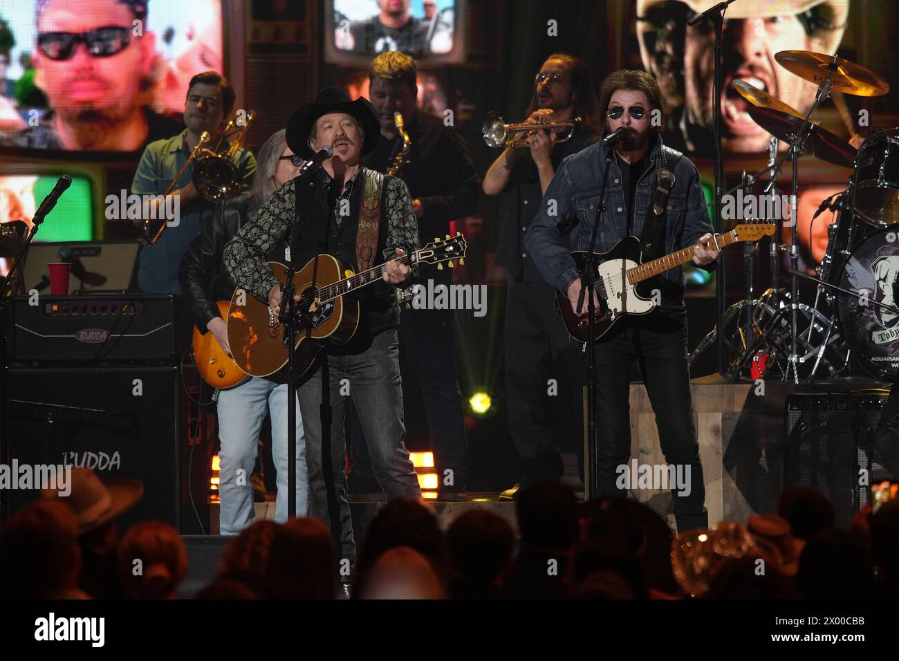 Kix Brooks and Ronnie Dunn of Brooks and Dunn perform onstage during ...