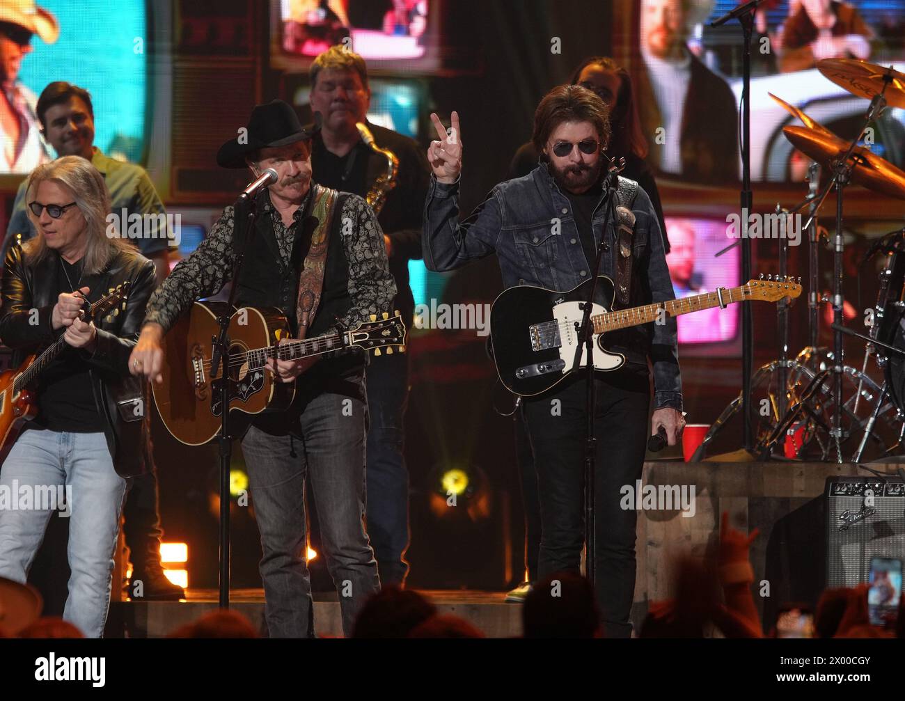 Kix Brooks and Ronnie Dunn of Brooks and Dunn perform onstage during ...