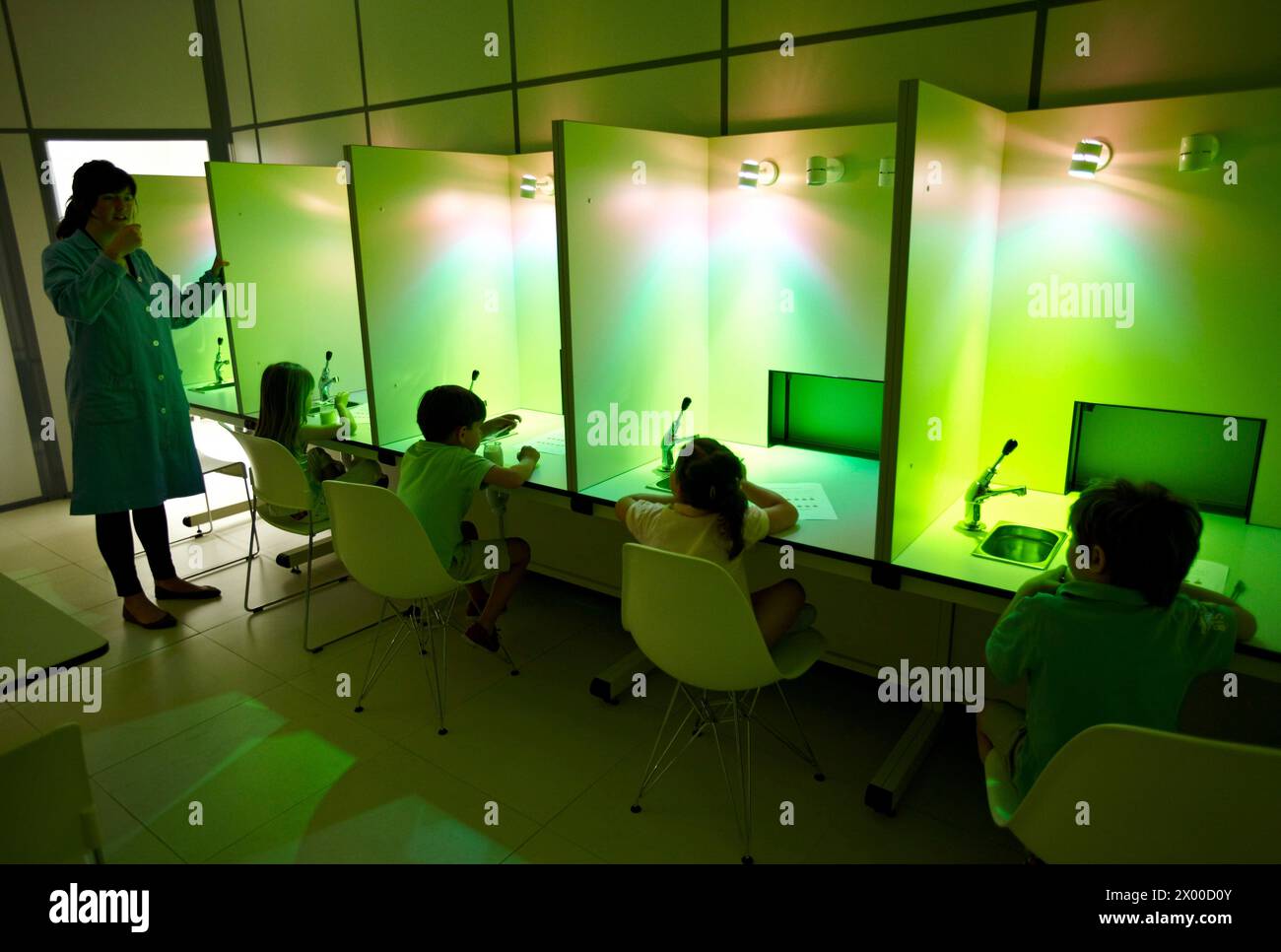 Children tutored by a sensory analysis specialist during a yoghurt ...