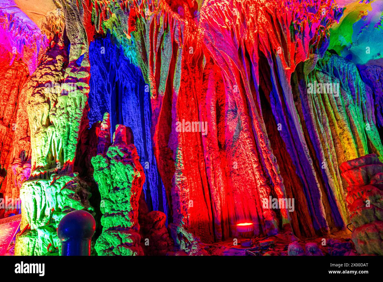 beautiful illuminated multicolored stalactites from karst Silver cave ...