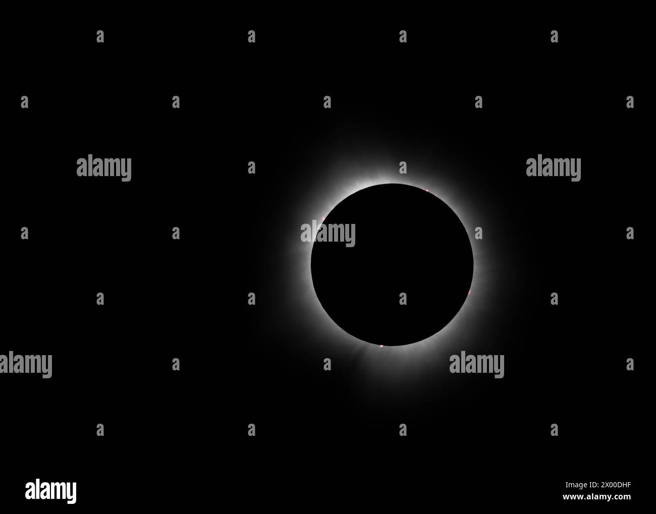 BLOOMINGTON, INDIANA - APRIL 8: The moon passes in front of the sun ...