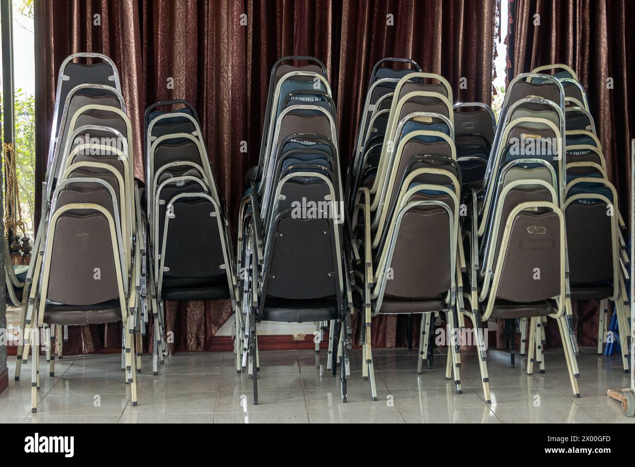 Hall chairs stacked hi-res stock photography and images - Alamy