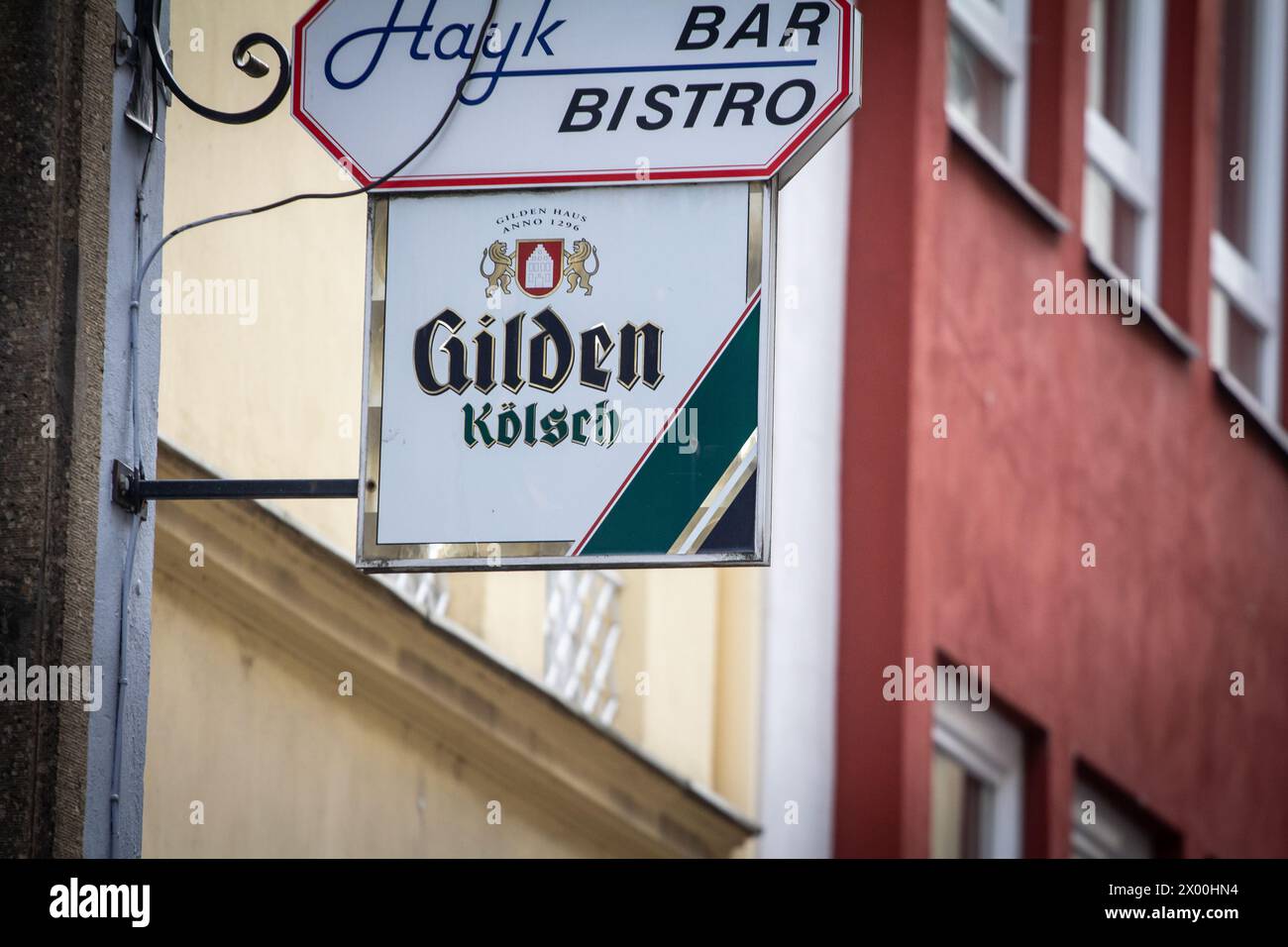 Picture of a sign with the logo of Gilden Kolsch beer on a local bar in ...