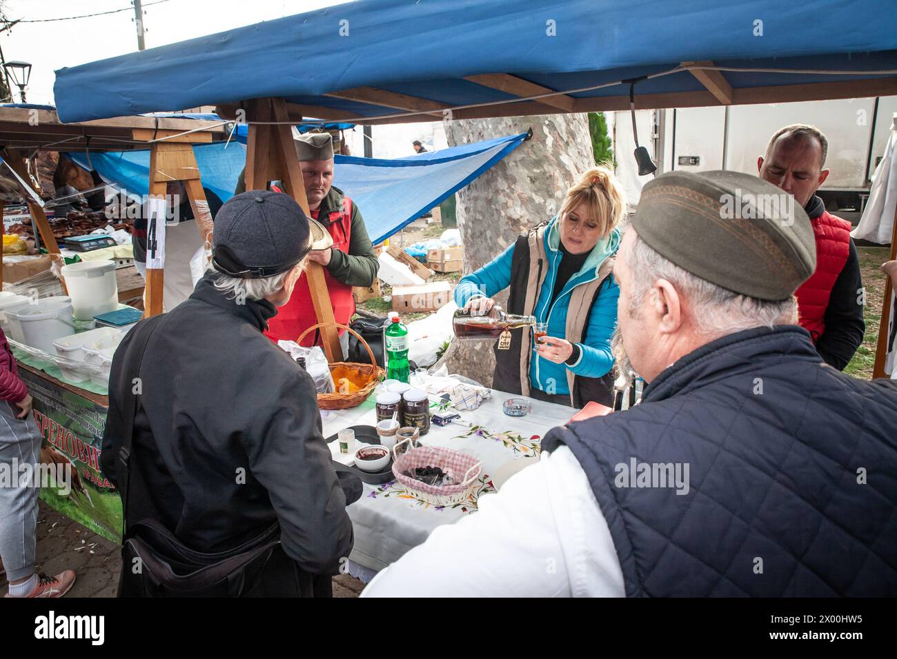 Picture of serbian people drinking sljivovica rakija in a market of ...