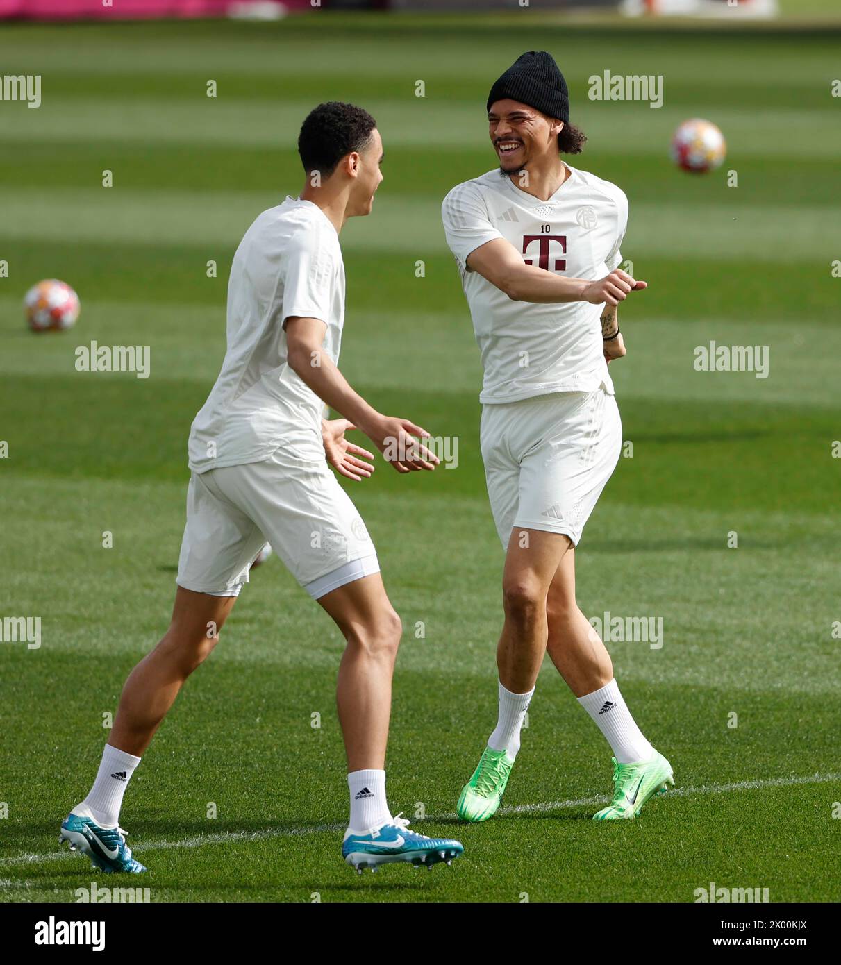 Munich, Germany. 8th Apr, 2024. Leroy Sane (R) and Jamal Musiala of ...