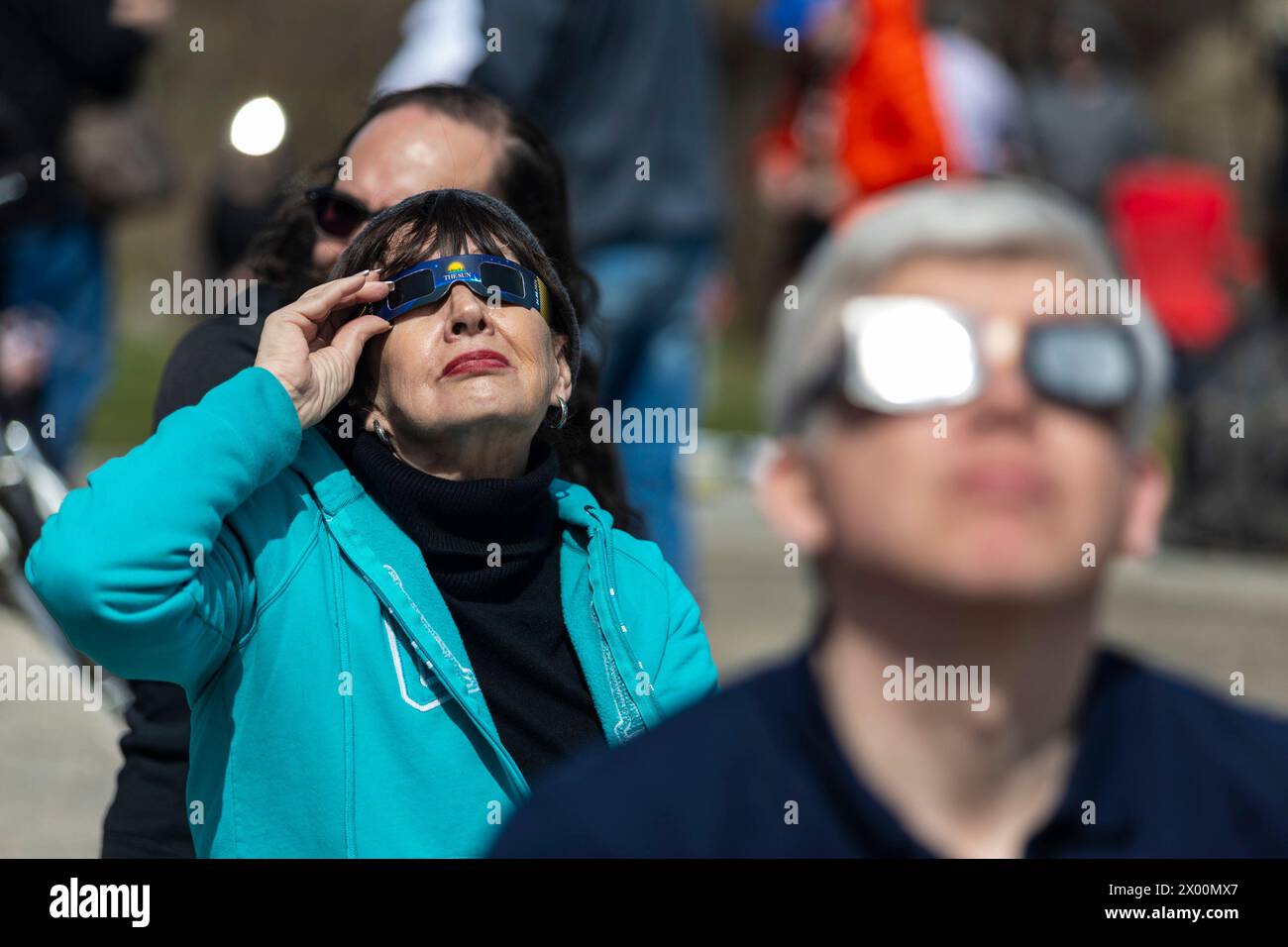 Plattsburgh, USA. 8th Apr, 2024. People watch a solar eclipse at ...