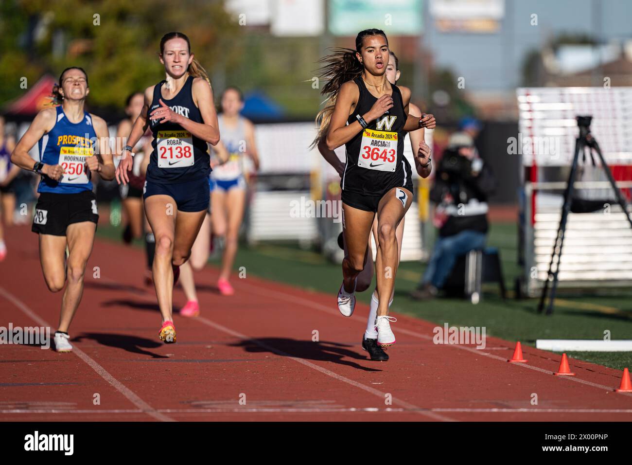 Kaitlyn Arciaga of Westview wins the seeded 800 meter run in 2:09.26 ...