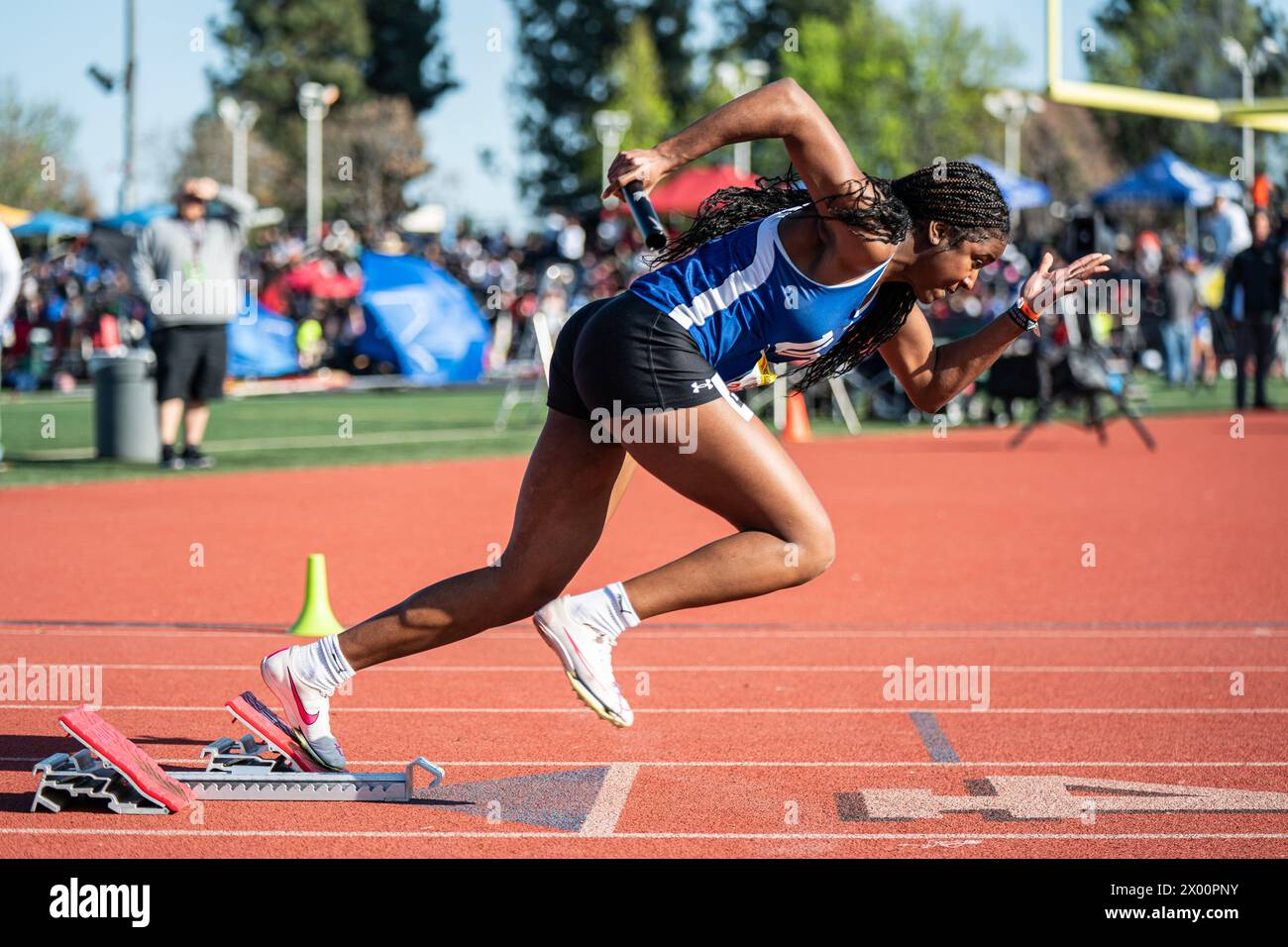 Taylor Aska of Union Catholic runs the first leg of the invitational ...