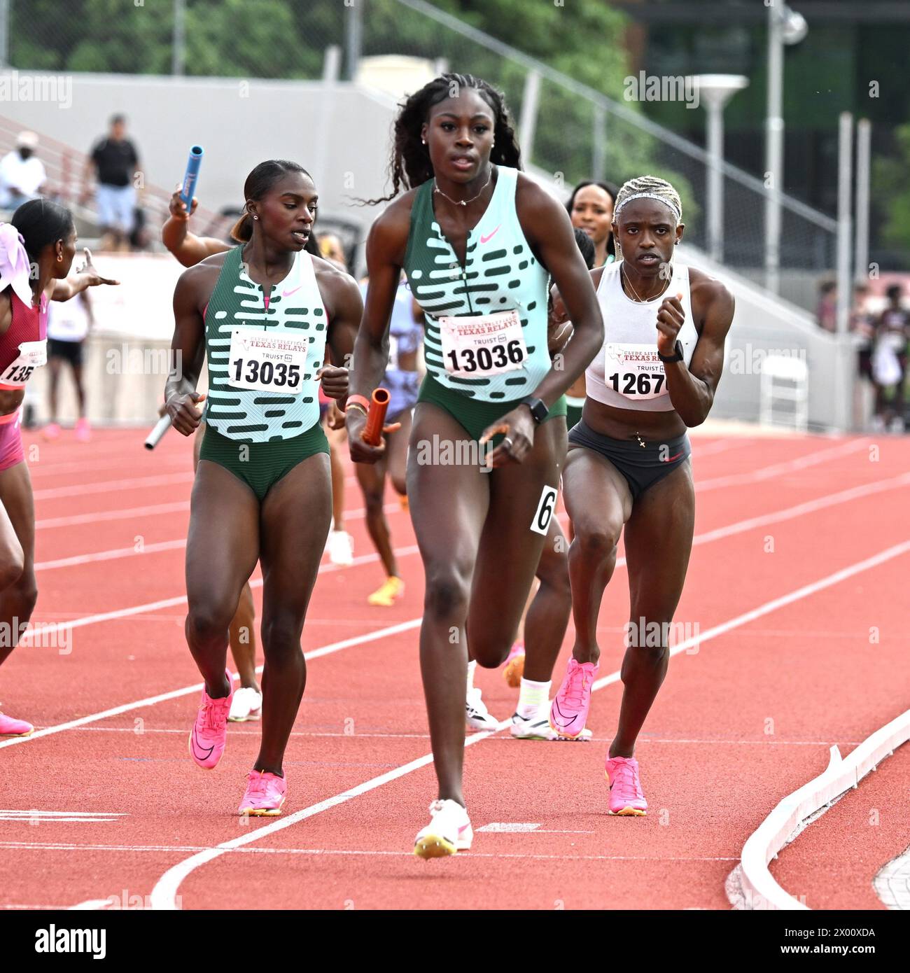 Rhasidat Adeleke takes the handoff from Dina Asher-Smith on the anchor ...