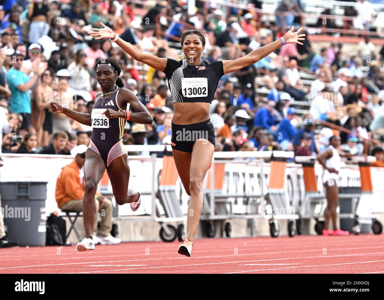 Gabby Thomas celebrates 100m victory during the Clyde LittleField Texas ...