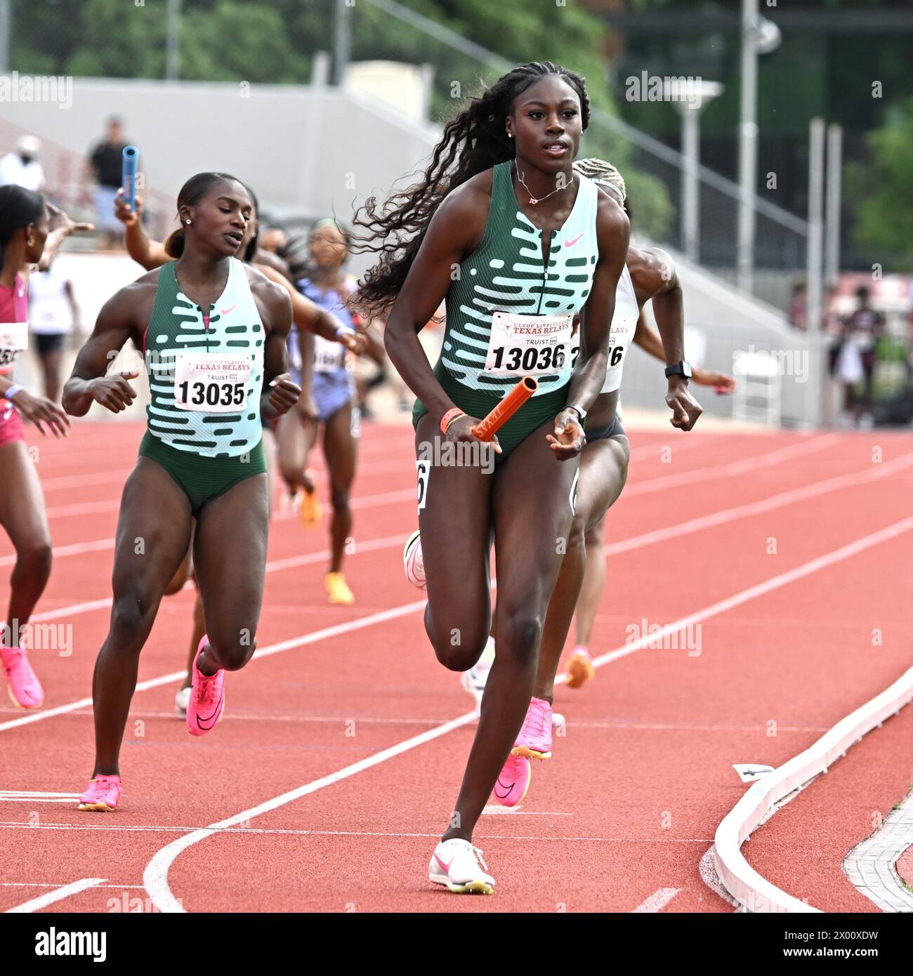 Rhasidat Adeleke takes the handoff from Dina Asher-Smith on the anchor ...