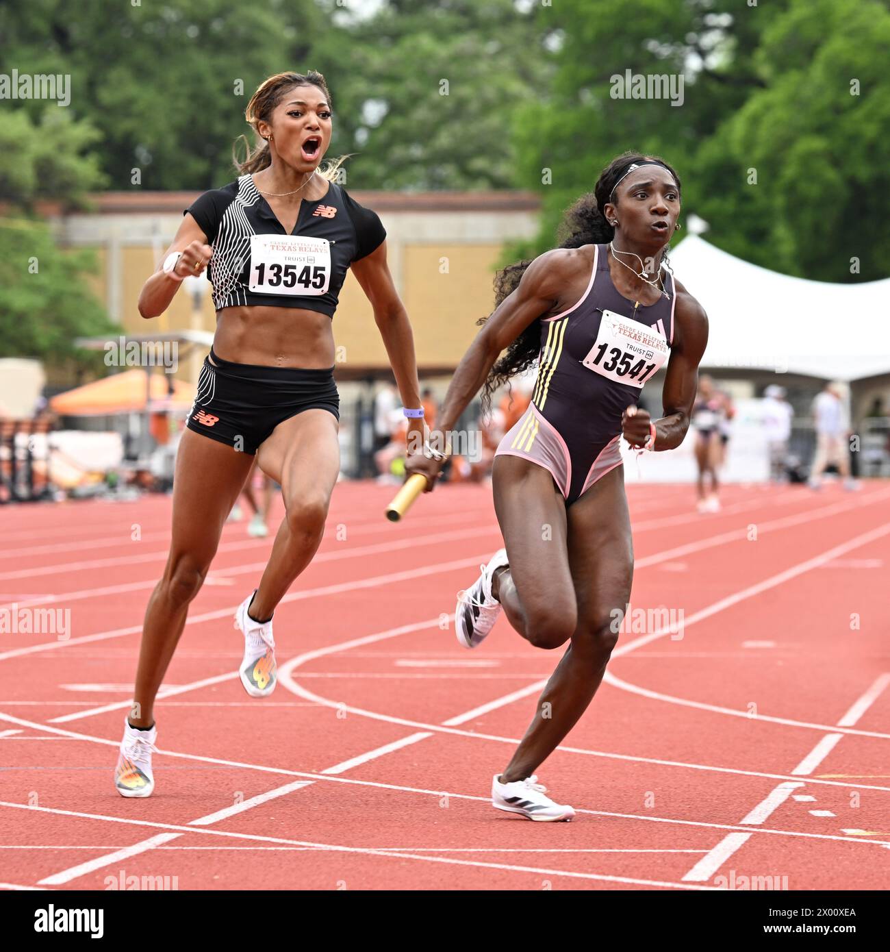 Tamara Clark takes the handoff from Gabby Thomas in the invitational ...