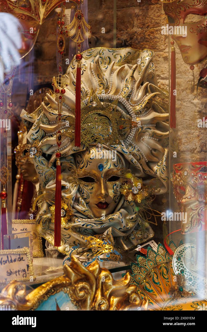 Venetian masks in store display in Venice. Annual carnival in Venice is ...