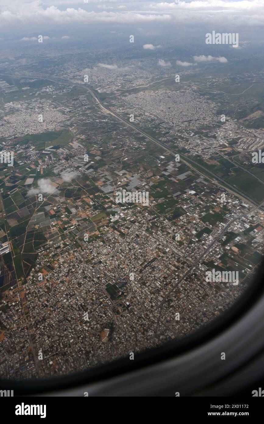 An aerial view of the Israeli arab towns of Tayibe, Tira and Qalansawe ...