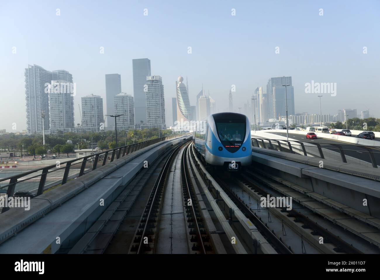 Dubai's modern skyline viewed from the elevated metro train. Dubai, UAE ...