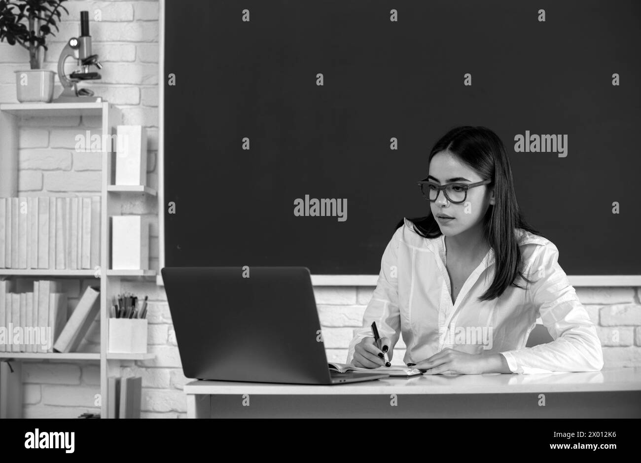 Portrait of female university student study lesson at school or ...