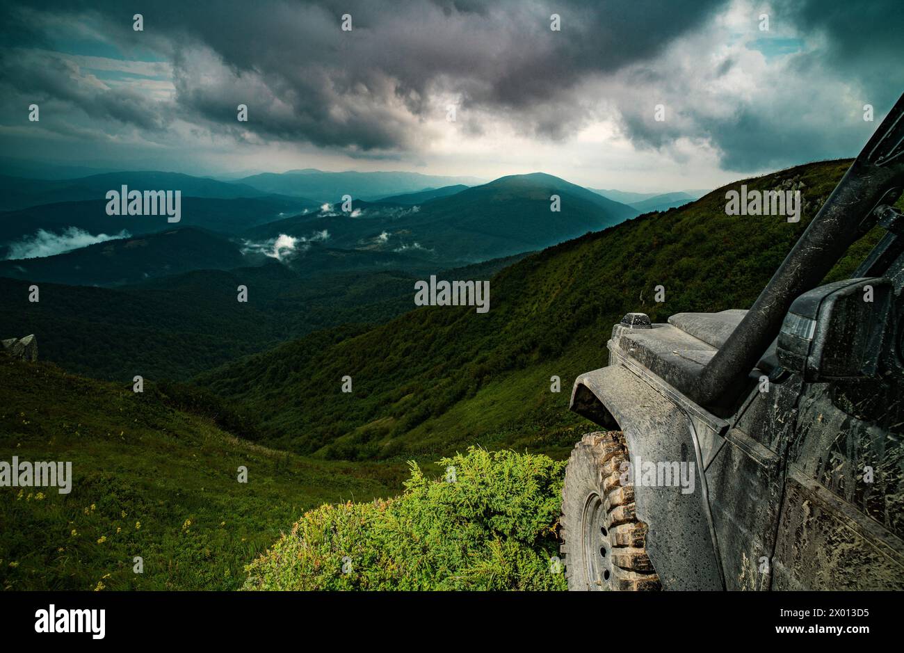 Extreme off road tour in a forest. Classic 4x4 car crossing water with ...