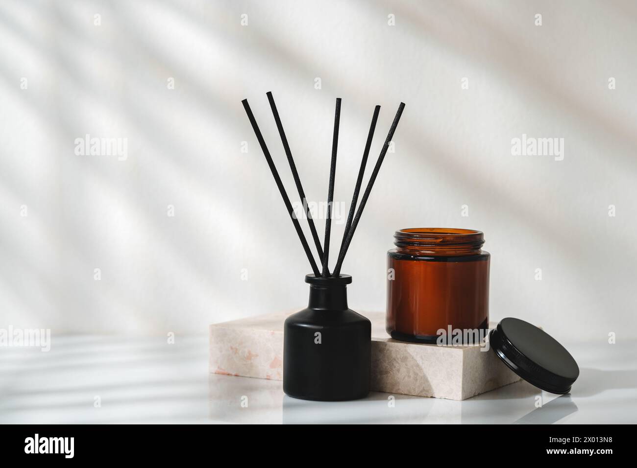 Elegant Aroma Diffuser With Black Reeds on a Marble Stand in Soft ...