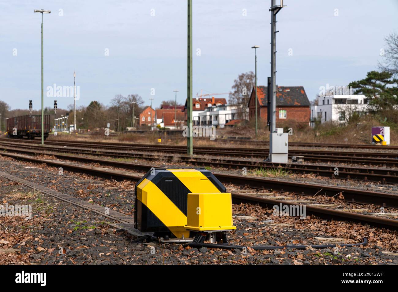 Yellow-black painted railway switch system. Close up Stock Photo - Alamy