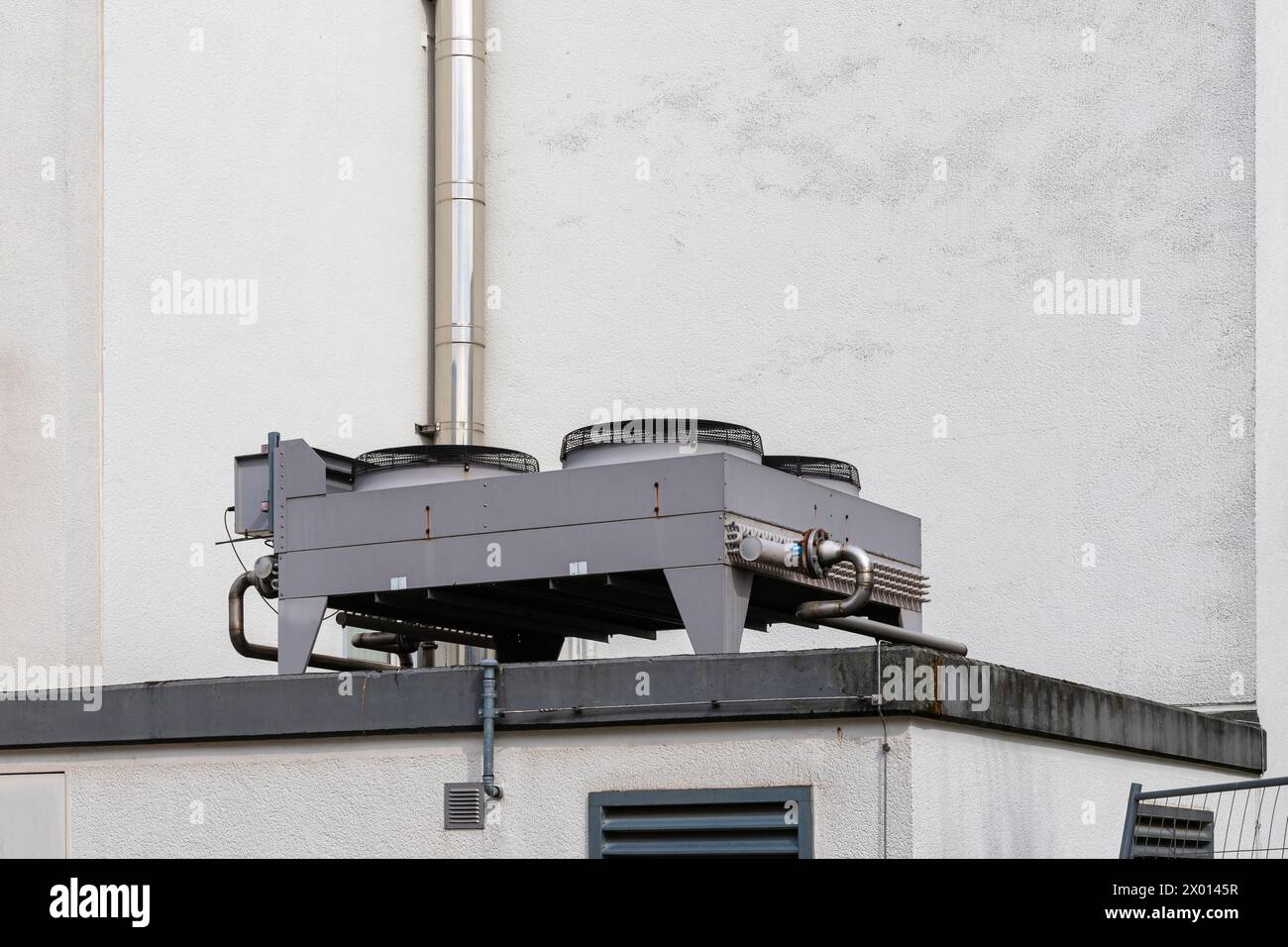 Part of the ventilation system of an industrial building with big fans ...