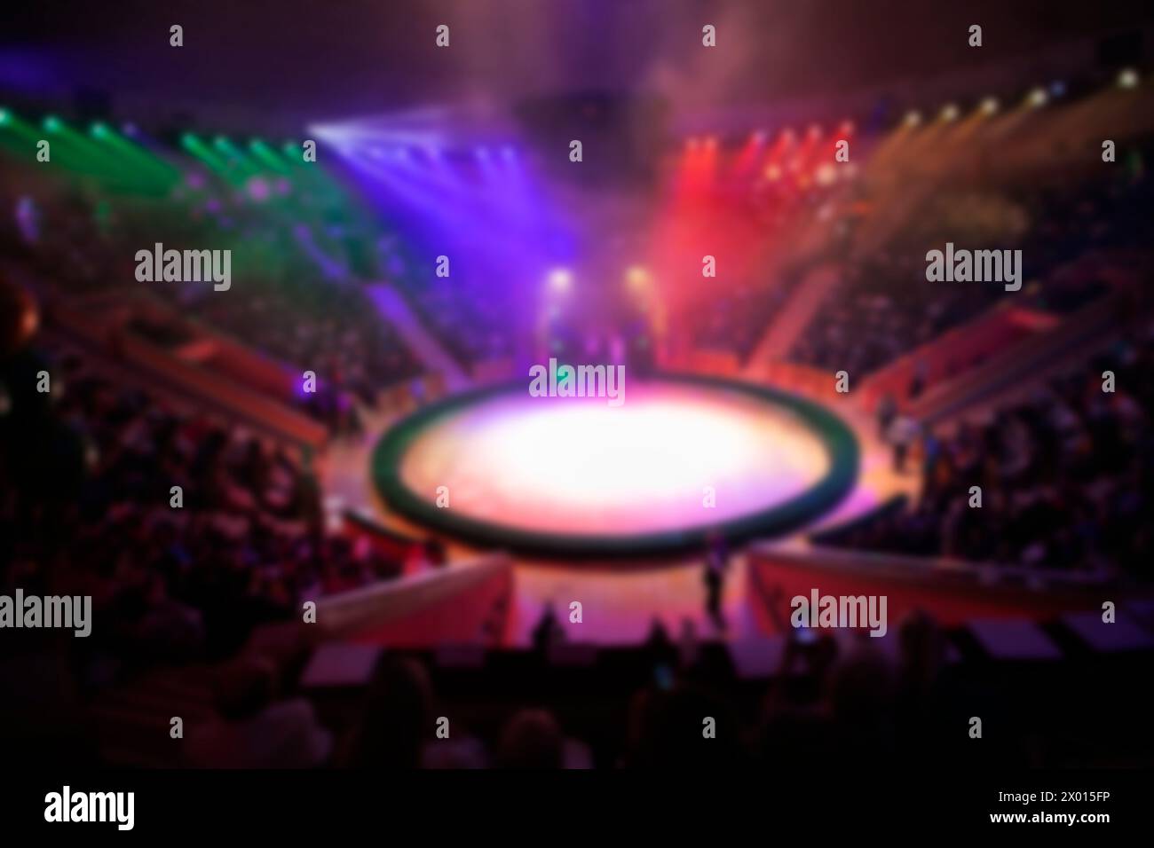 Blurred circus arena in light rays and multi-colored lights Stock Photo ...