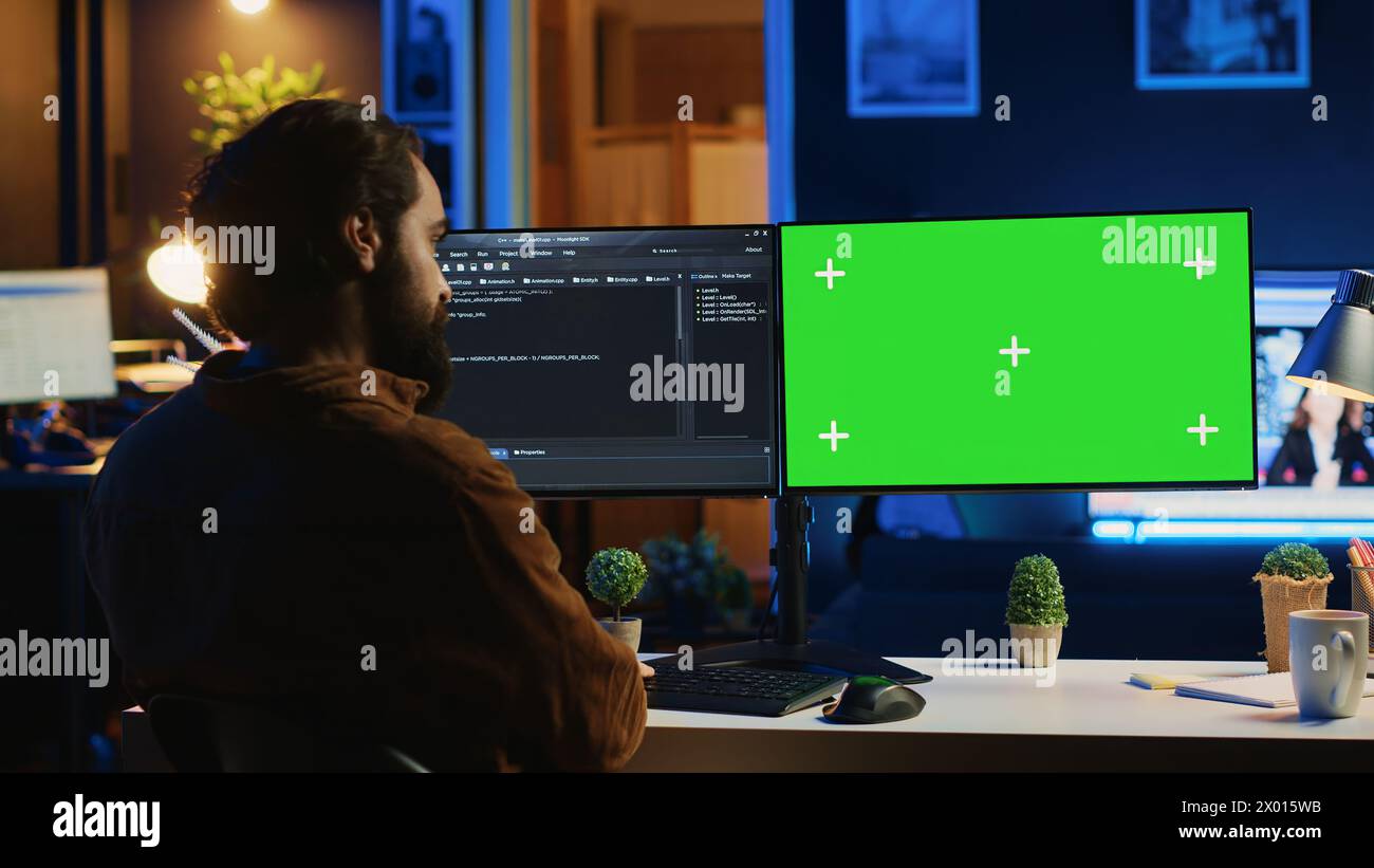 Self employed man doing IT support job from apartment personal office ...