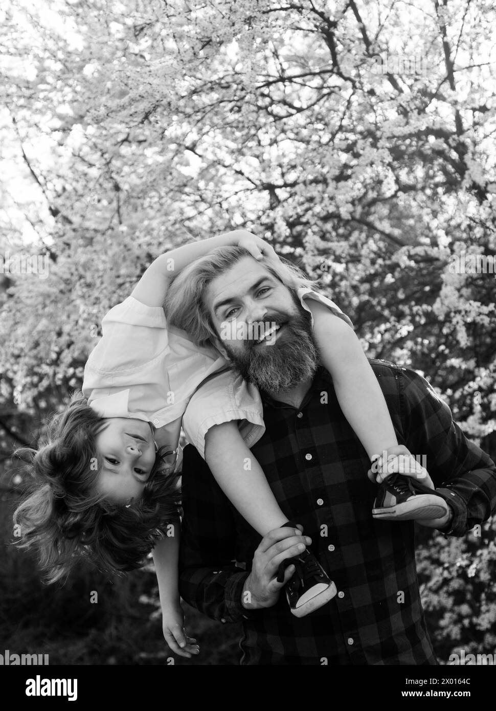 Happy kid shoulder ride on dad. Fathers Day. Father Son relationships ...