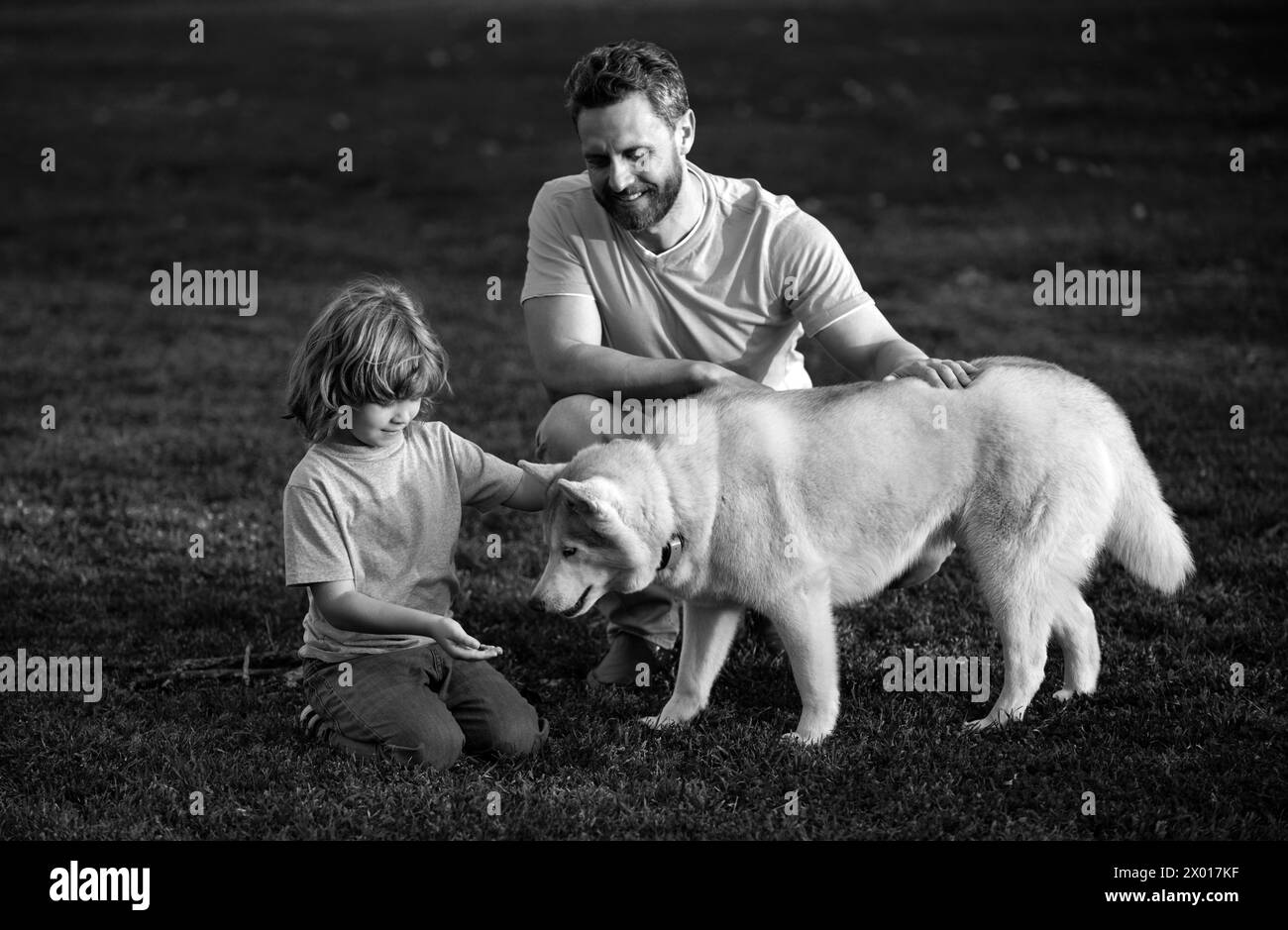 Childhood and parenthood kids concept. Happy father and son playing ...