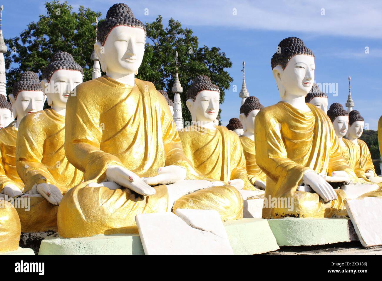 Rows of old stone statues of Buddha, Aung Setkya Paya, near to famous ...