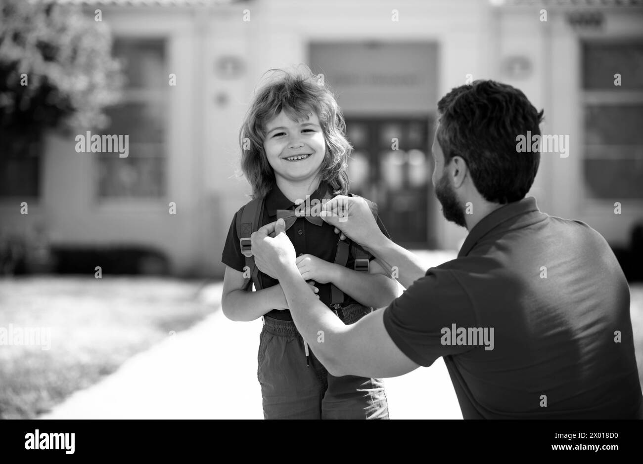 Happy father and son go to elementary school. Parent taking child to ...