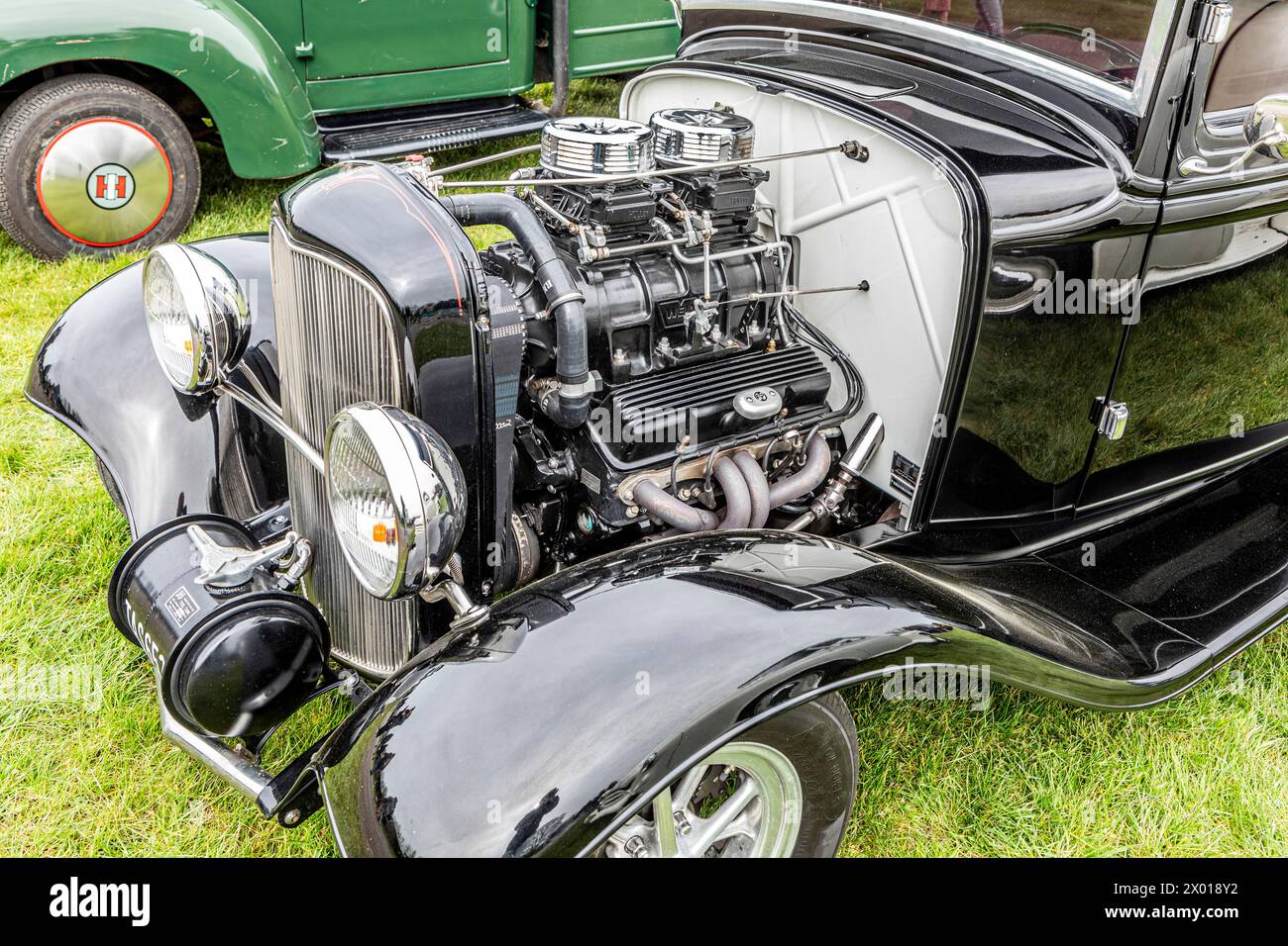 A supercharged V8 engine in a classic Ford Hot Rod Stock Photo - Alamy