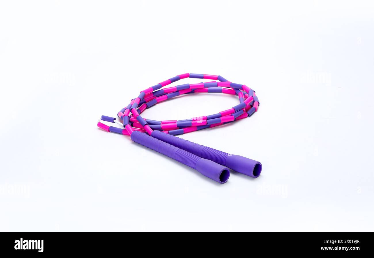 purple and pink skipping rope isolated on white background Stock Photo ...