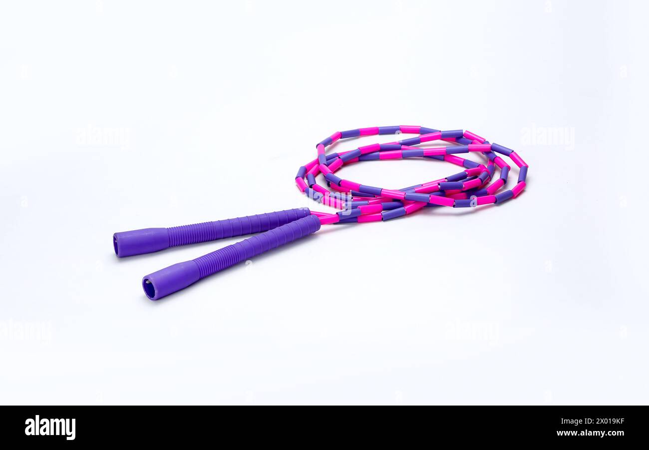 purple and pink skipping rope isolated on white background Stock Photo ...