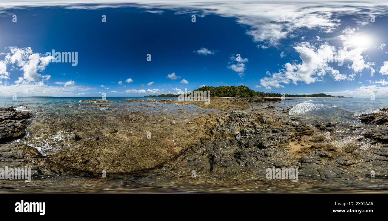 Tropical ocean waves over corals and rocks in beach. Santa Fe, Romblon ...