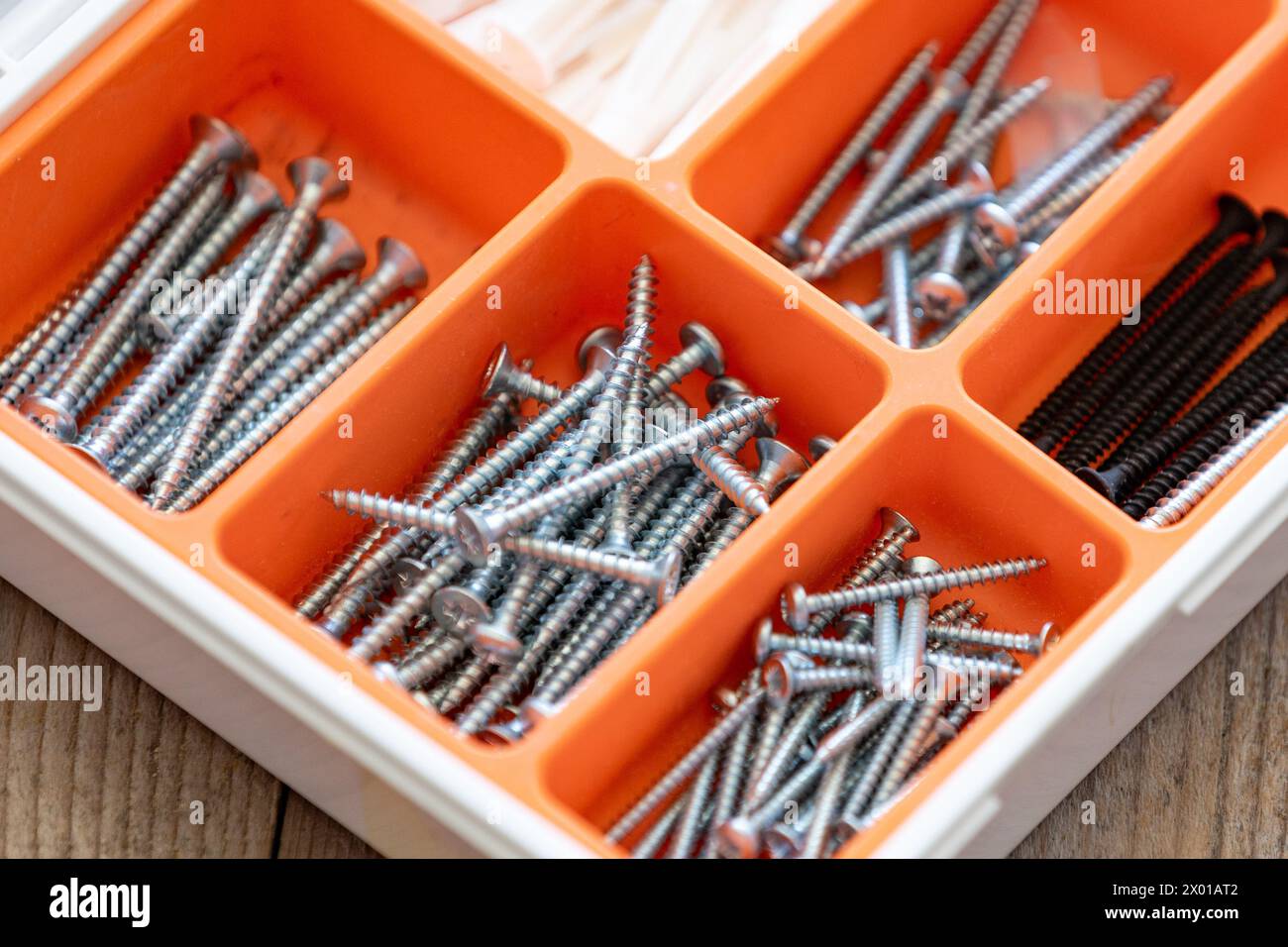Collection of nails, thumb nails, screws, plastic and bolts in plastic ...